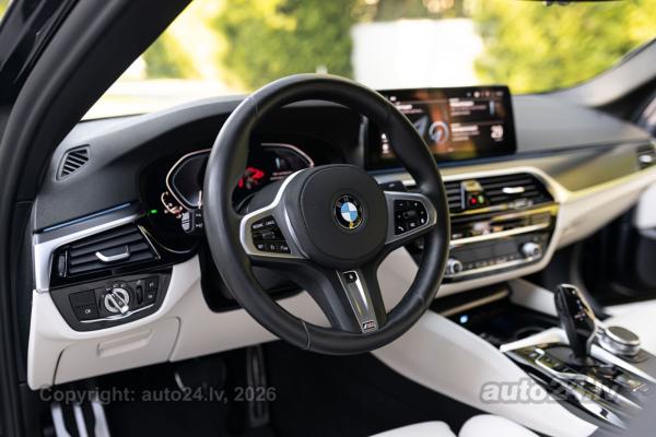 Black BMW 5 Series 2021 in Tallinn, with an engine capacity of 2.00 L and mileage of 153 thousand km for 26900 €, photo 9 on AUTOMOTO.COM.LV