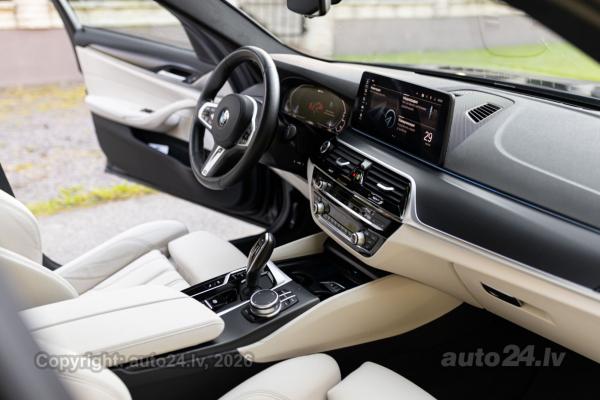Black BMW 5 Series 2021 in Tallinn, with an engine capacity of 2.00 L and mileage of 153 thousand km for 26900 €, photo 11 on AUTOMOTO.COM.LV