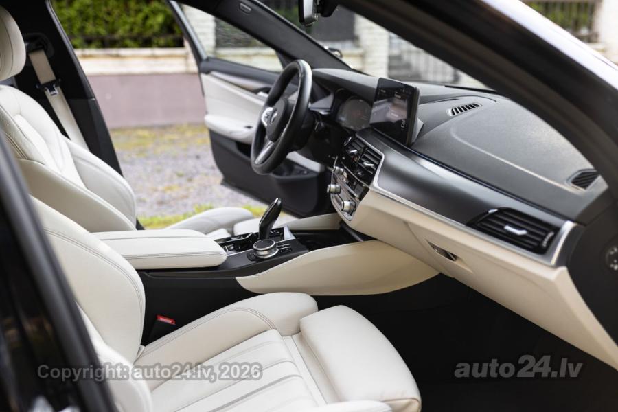 Black BMW 5 Series 2021 in Tallinn, with an engine capacity of 2.00 L and mileage of 153 thousand km for 26900 €, photo 13 on AUTOMOTO.COM.LV