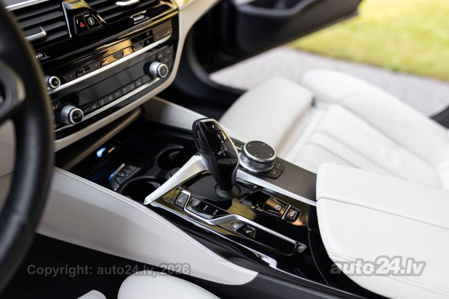 Black BMW 5 Series 2021 in Tallinn, with an engine capacity of 2.00 L and mileage of 153 thousand km for 26900 €, photo 16 on AUTOMOTO.COM.LV