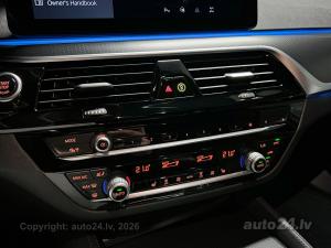Melns BMW 5 Series 2022 Tallina, ar dzinēja tilpumu 2.00 L un nobraukumu 83 tūkst. km par 36900 €, foto 20 vietnē AUTOMOTO.COM.LV