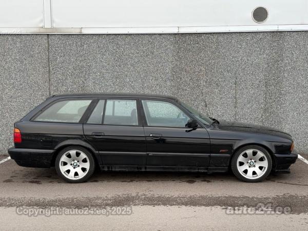 Black BMW 5 Series 1995 in Tallinn, with an engine capacity of 4.00 L and mileage of 321 thousand km for 7999 €, photo 3 on AUTOMOTO.COM.LV