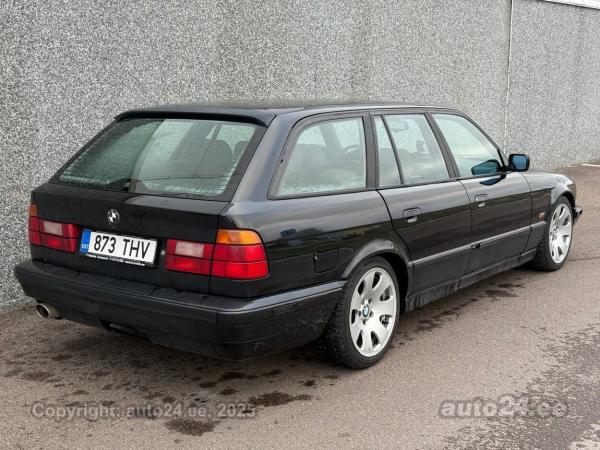 Black BMW 5 Series 1995 in Tallinn, with an engine capacity of 4.00 L and mileage of 321 thousand km for 7999 €, photo 5 on AUTOMOTO.COM.LV