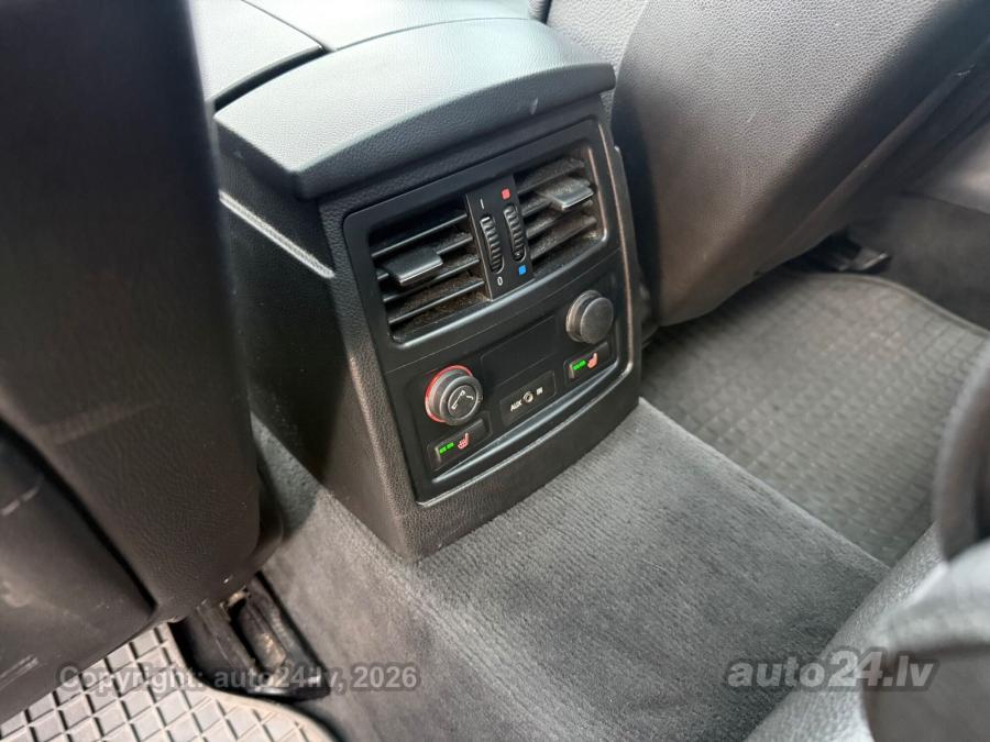 Black BMW 5 Series 2007 in Tartu, with an engine capacity of 3.00 L and mileage of 423 thousand km for 4999 €, photo 18 on AUTOMOTO.COM.LV