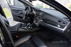 Black BMW 5 Series 2011 in Tallinn, with an engine capacity of 3.00 L and mileage of 291 thousand km for 11599 €, photo 15 on AUTOMOTO.COM.LV