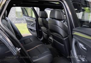 Black BMW 5 Series 2011 in Tallinn, with an engine capacity of 3.00 L and mileage of 291 thousand km for 11599 €, photo 18 on AUTOMOTO.COM.LV