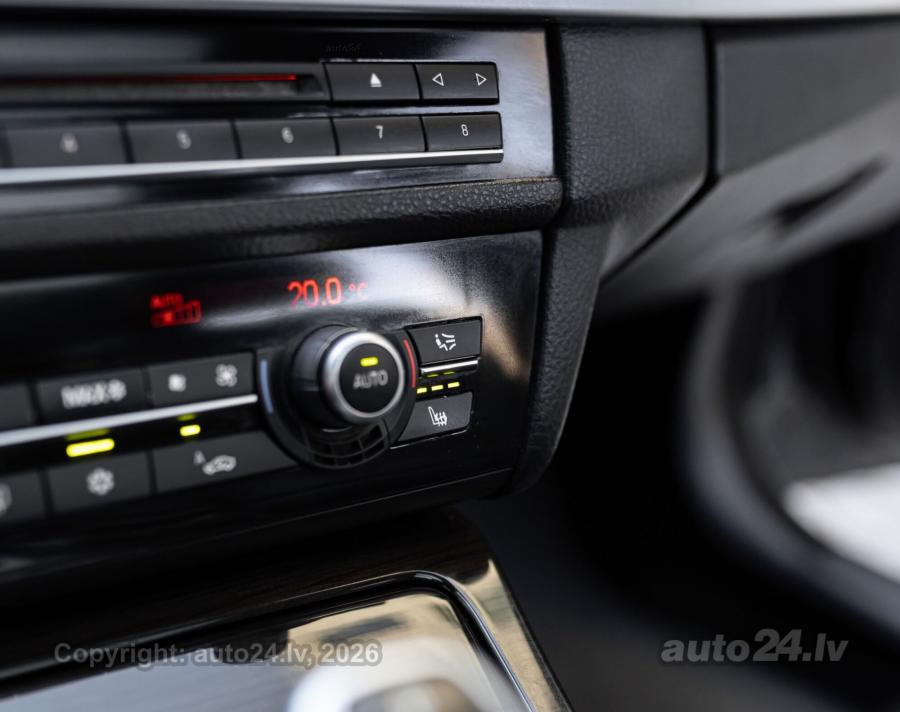 Black BMW 5 Series 2011 in Tallinn, with an engine capacity of 3.00 L and mileage of 291 thousand km for 11599 €, photo 23 on AUTOMOTO.COM.LV