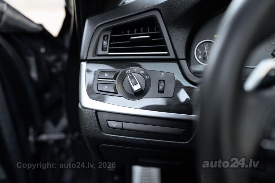 Black BMW 5 Series 2011 in Tallinn, with an engine capacity of 3.00 L and mileage of 291 thousand km for 11599 €, photo 25 on AUTOMOTO.COM.LV