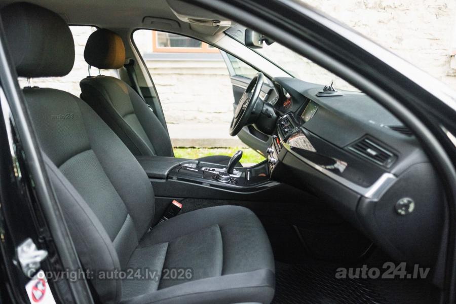 Black BMW 5 Series 2013 in Tallinn, with an engine capacity of 2.00 L and mileage of 360 thousand km for 6790 €, photo 12 on AUTOMOTO.COM.LV