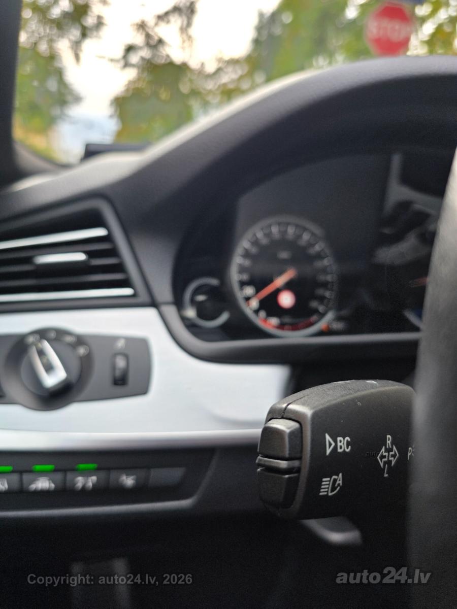 Black BMW 5 Series 2014 in Tallinn, with an engine capacity of 3.00 L and mileage of 275 thousand km for 13999 €, photo 14 on AUTOMOTO.COM.LV