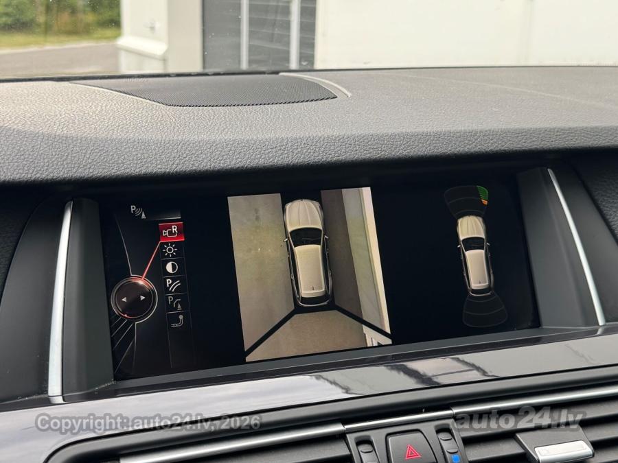 Black BMW 5 Series 2015 in Tallinn, with an engine capacity of 3.00 L and mileage of 269 thousand km for 11799 €, photo 19 on AUTOMOTO.COM.LV
