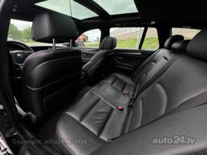 Black BMW 5 Series 2017 in Tallinn, with an engine capacity of 3.00 L and mileage of 277 thousand km for 12790 €, photo 11 on AUTOMOTO.COM.LV