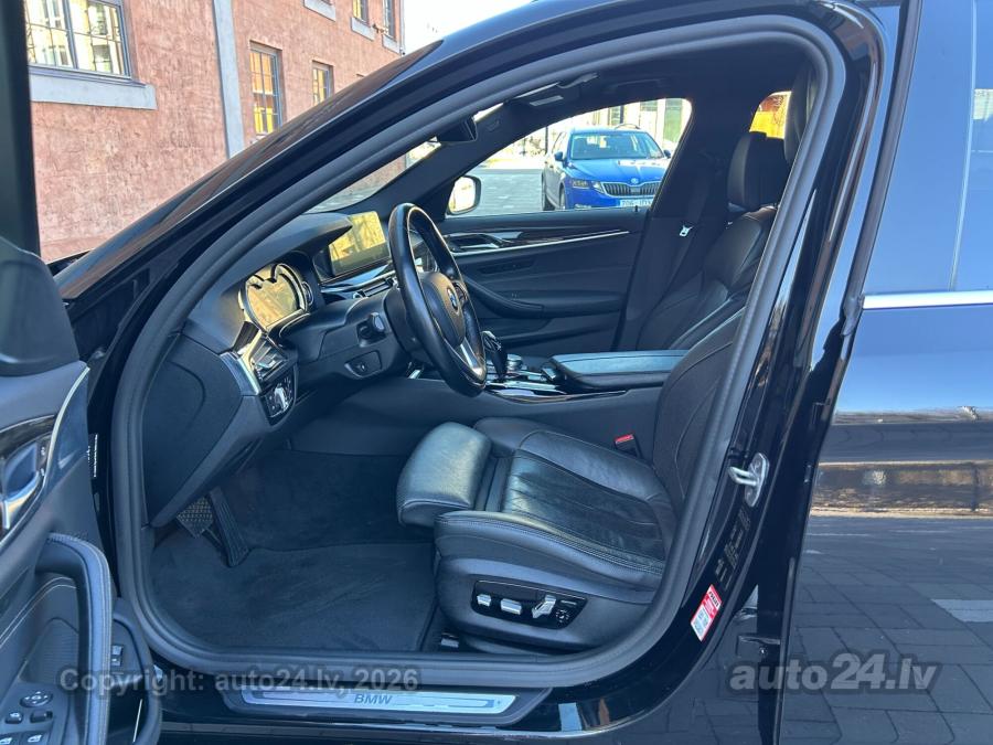 Black BMW 5 Series 2018 in Tallinn, with an engine capacity of 3.00 L and mileage of 190 thousand km for 21899 €, photo 11 on AUTOMOTO.COM.LV