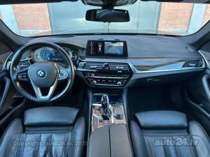 Black BMW 5 Series 2018 in Tallinn, with an engine capacity of 3.00 L and mileage of 190 thousand km for 21899 €, photo 21 on AUTOMOTO.COM.LV
