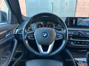 Black BMW 5 Series 2018 in Tallinn, with an engine capacity of 3.00 L and mileage of 190 thousand km for 21899 €, photo 22 on AUTOMOTO.COM.LV