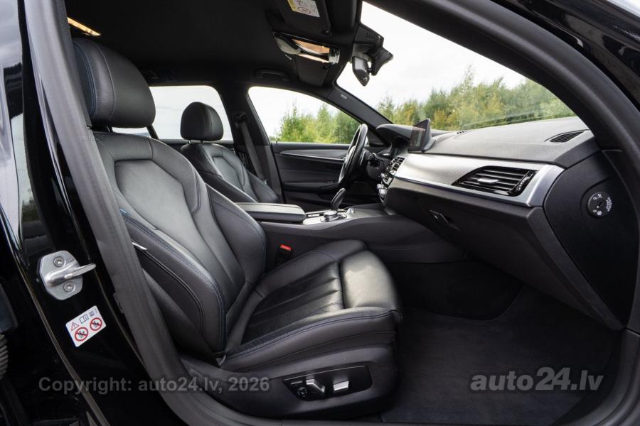 Black BMW 5 Series 2019 in Tallinn, with an engine capacity of 3.00 L and mileage of 244 thousand km for 24900 €, photo 8 on AUTOMOTO.COM.LV