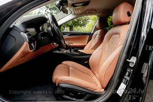 Black BMW 5 Series 2020 in Parnu, with an engine capacity of 3.00 L and mileage of 178 thousand km for 22499 €, photo 14 on AUTOMOTO.COM.LV