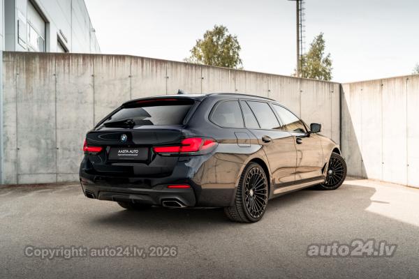 Black BMW 5 Series 2021 in Tartu, with an engine capacity of 3.00 L and mileage of 189 thousand km for 29900 €, photo 2 on AUTOMOTO.COM.LV