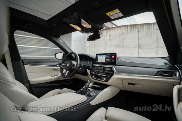 Black BMW 5 Series 2021 in Tartu, with an engine capacity of 3.00 L and mileage of 189 thousand km for 29900 €, photo 3 on AUTOMOTO.COM.LV