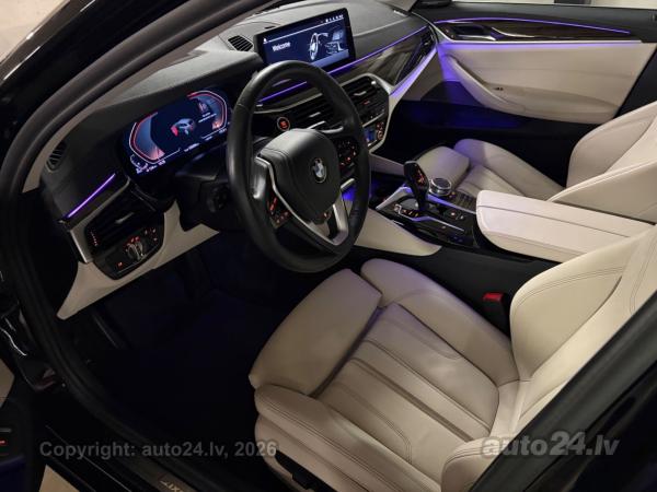 Black BMW 5 Series 2021 in Tallinn, with an engine capacity of 2.00 L and mileage of 120 thousand km for 28500 €, photo 6 on AUTOMOTO.COM.LV