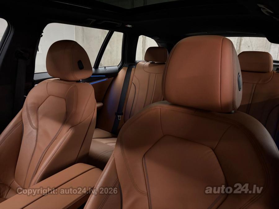 Melns BMW 5 Series 2023 Tallina, ar dzinēja tilpumu 0.00 L un nobraukumu 105 tūkst. km par 32900 €, foto 12 vietnē AUTOMOTO.COM.LV