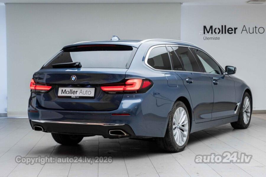 Blue BMW 5 Series 2023 in Tallinn, with an engine capacity of 2.00 L and mileage of 141 thousand km for 31900 €, photo 5 on AUTOMOTO.COM.LV