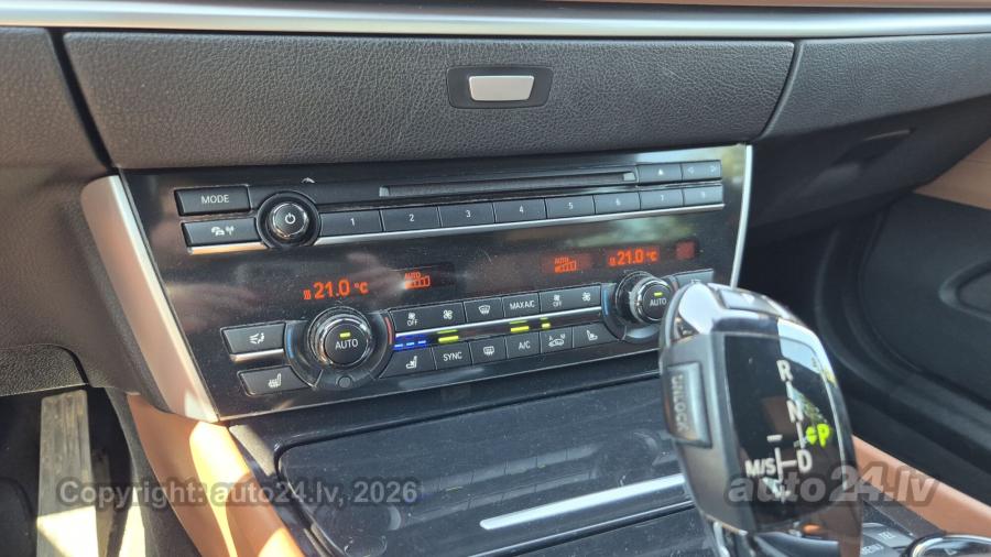Brown BMW 5 Series 2014 in Keila, with an engine capacity of 3.00 L and mileage of 127 thousand km for 18500 €, photo 14 on AUTOMOTO.COM.LV