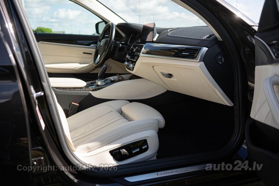 Brown BMW 5 Series 2017 in Tartu, with an engine capacity of 3.00 L and mileage of 125 thousand km for 24900 €, photo 23 on AUTOMOTO.COM.LV