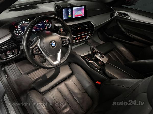 Grey BMW 5 Series 2017 in Tallinn, with an engine capacity of 3.00 L and mileage of 211 thousand km for 21990 €, photo 4 on AUTOMOTO.COM.LV