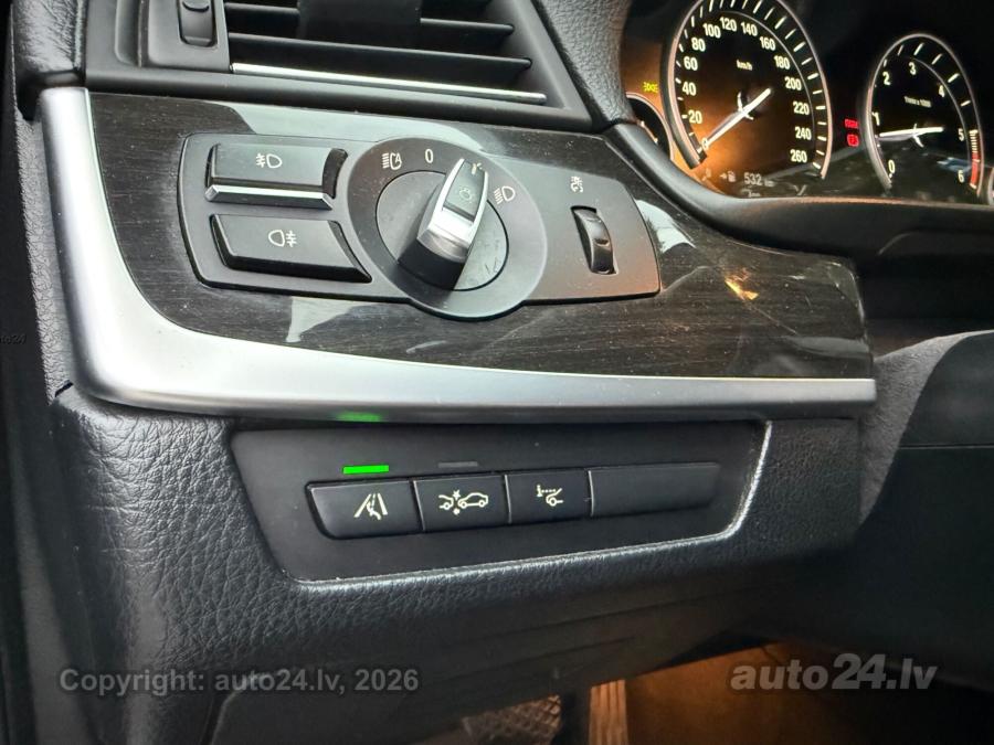 Grey BMW 5 Series 2012 in Tallinn, with an engine capacity of 3.00 L and mileage of 318 thousand km for 10490 €, photo 12 on AUTOMOTO.COM.LV