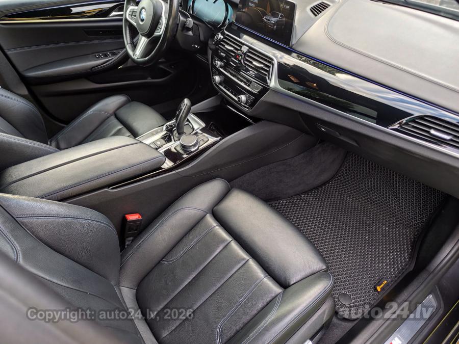 Grey BMW 5 Series 2018 in Tallinn, with an engine capacity of 3.00 L and mileage of 209 thousand km for 26499 €, photo 12 on AUTOMOTO.COM.LV