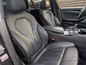 Grey BMW 5 Series 2018 in Tallinn, with an engine capacity of 3.00 L and mileage of 209 thousand km for 26499 €, photo 13 on AUTOMOTO.COM.LV