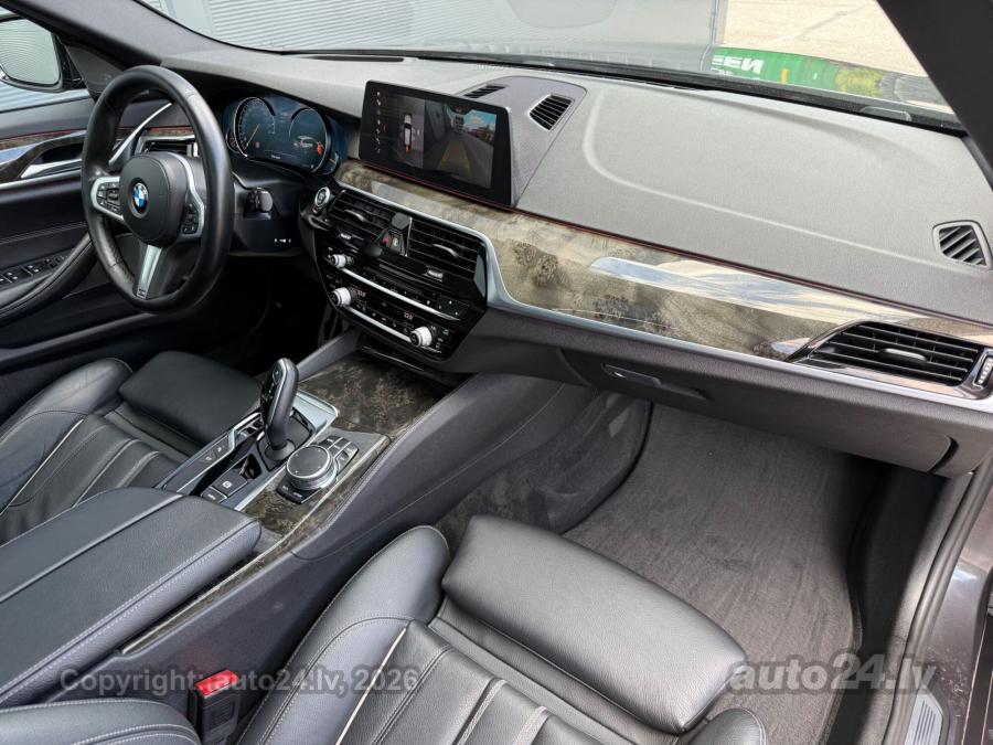 Grey BMW 5 Series 2018 in Tartu, with an engine capacity of 3.00 L and mileage of 169 thousand km for 21999 €, photo 19 on AUTOMOTO.COM.LV