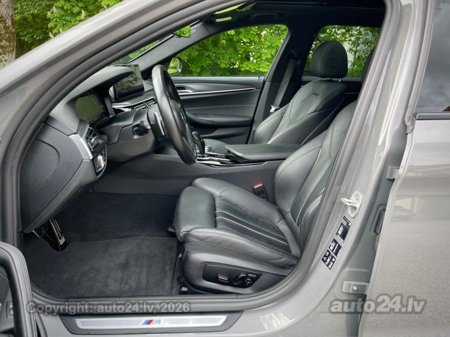 Grey BMW 5 Series 2021 in Tallinn, with an engine capacity of 3.00 L and mileage of 210 thousand km for 28500 €, photo 10 on AUTOMOTO.COM.LV