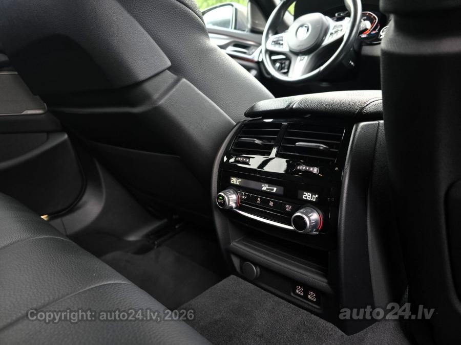 Grey BMW 5 Series 2023 in Tartu, with an engine capacity of 3.00 L and mileage of 183 thousand km for 34990 €, photo 20 on AUTOMOTO.COM.LV