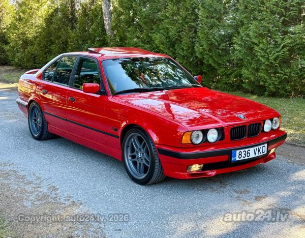 Red BMW 5 Series 1994 in Tallinn, with an engine capacity of 4.00 L and mileage of 250 thousand km for 18999 €, photo 1 on AUTOMOTO.COM.LV