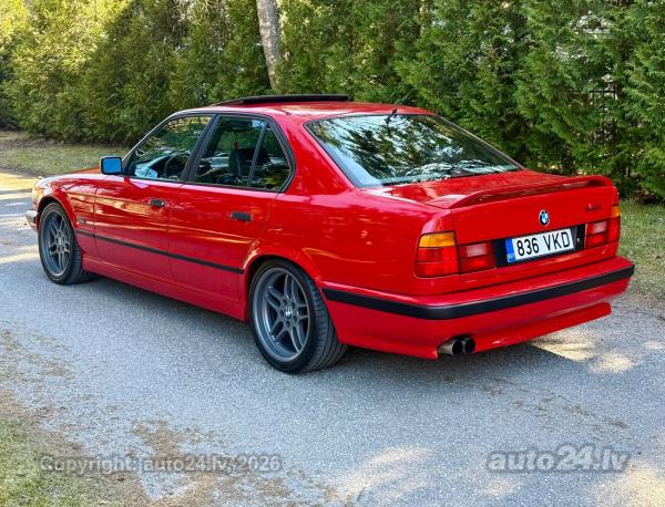 Red BMW 5 Series 1994 in Tallinn, with an engine capacity of 4.00 L and mileage of 250 thousand km for 18999 €, photo 7 on AUTOMOTO.COM.LV