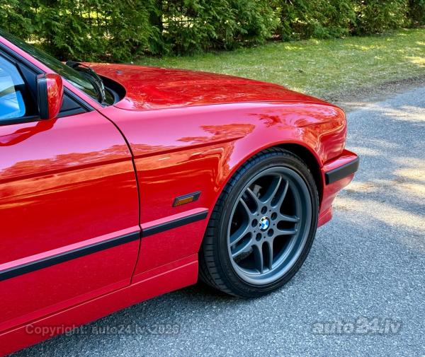 Red BMW 5 Series 1994 in Tallinn, with an engine capacity of 4.00 L and mileage of 250 thousand km for 18999 €, photo 10 on AUTOMOTO.COM.LV