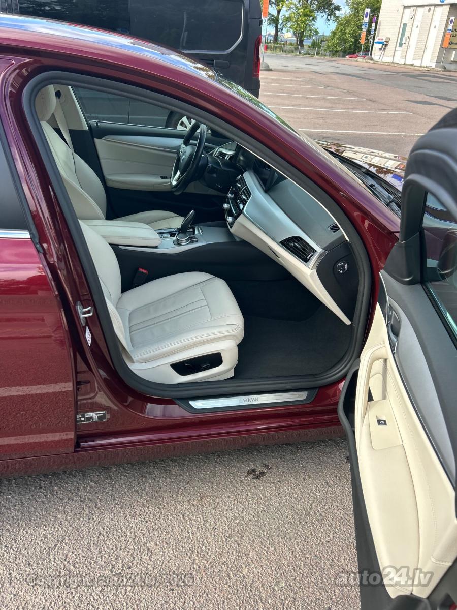 Red BMW 5 Series 2021 in Tallinn, with an engine capacity of 2.00 L and mileage of 173 thousand km for 26900 €, photo 12 on AUTOMOTO.COM.LV