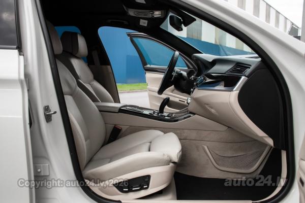 White BMW 5 Series 2013 in Tallinn, with an engine capacity of 3.00 L and mileage of 190 thousand km for 12990 €, photo 11 on AUTOMOTO.COM.LV