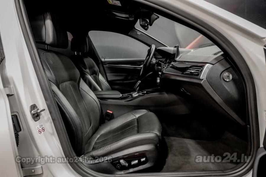 White BMW 5 Series 2018 in Parnu, with an engine capacity of 3.00 L and mileage of 348 thousand km for 14999 €, photo 12 on AUTOMOTO.COM.LV