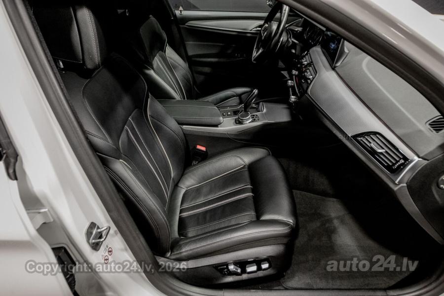 White BMW 5 Series 2018 in Parnu, with an engine capacity of 3.00 L and mileage of 238 thousand km for 22999 €, photo 14 on AUTOMOTO.COM.LV