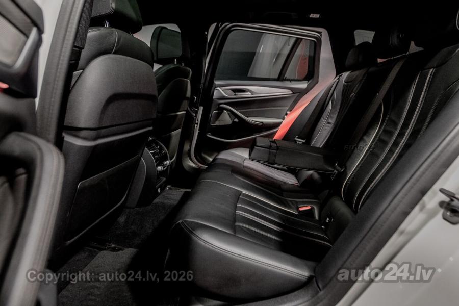 White BMW 5 Series 2018 in Parnu, with an engine capacity of 3.00 L and mileage of 238 thousand km for 22999 €, photo 16 on AUTOMOTO.COM.LV