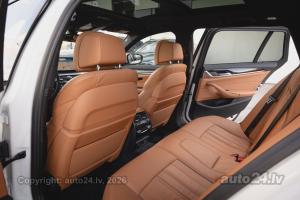 White BMW 5 Series 2022 in Tartu, with an engine capacity of 2.00 L and mileage of 69 thousand km for 36900 €, photo 26 on AUTOMOTO.COM.LV