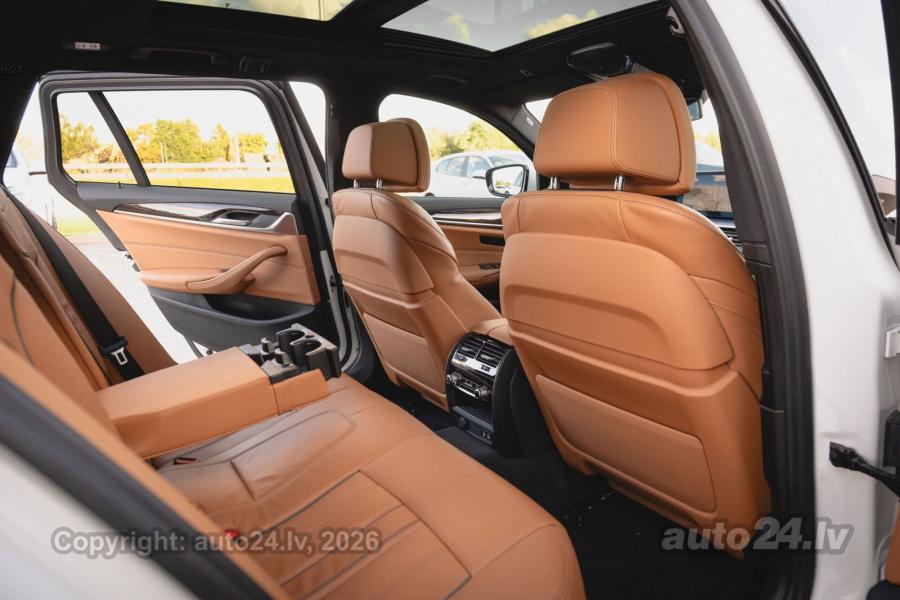 White BMW 5 Series 2022 in Tartu, with an engine capacity of 2.00 L and mileage of 69 thousand km for 36900 €, photo 28 on AUTOMOTO.COM.LV