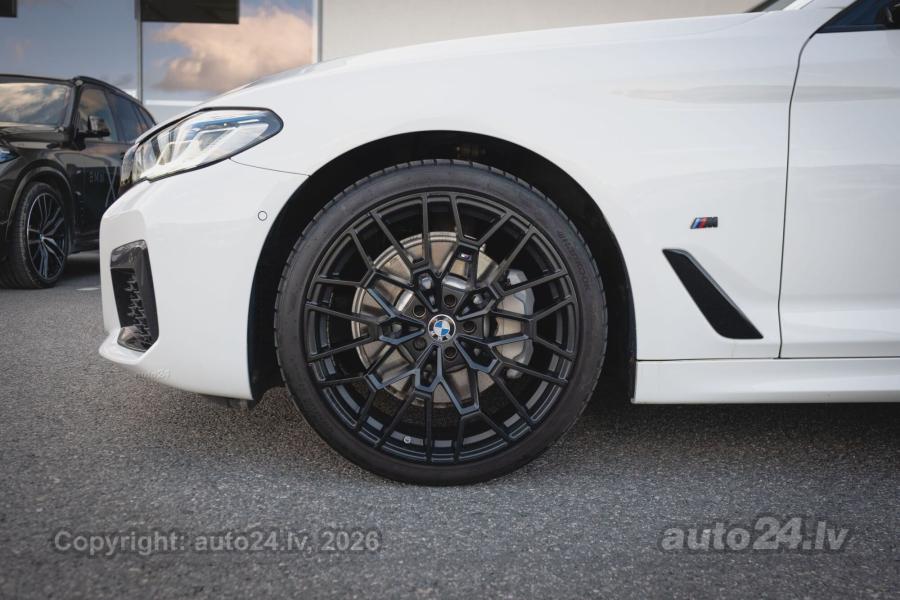 White BMW 5 Series 2022 in Tartu, with an engine capacity of 2.00 L and mileage of 69 thousand km for 36900 €, photo 53 on AUTOMOTO.COM.LV