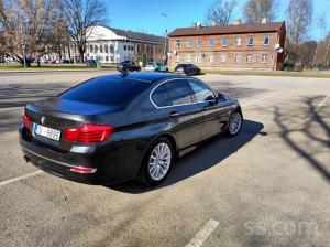 Black BMW 518 2014 in Riga, with an engine capacity of 2.00 L and mileage of 201 thousand km for 10800 €, photo 3 on AUTOMOTO.COM.LV