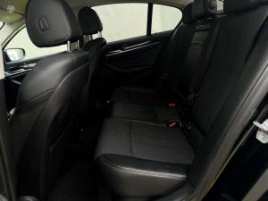 Black BMW 518 2019 in Vilnius, with an engine capacity of 2.00 L and mileage of 338 thousand km for 14950 €, photo 12 on AUTOMOTO.COM.LV