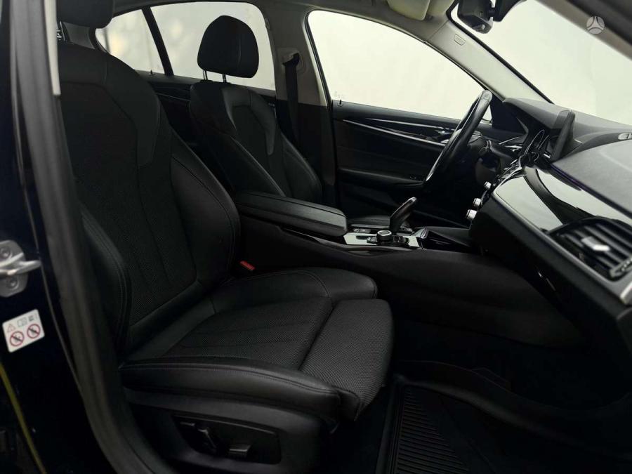 Black BMW 518 2019 in Vilnius, with an engine capacity of 2.00 L and mileage of 338 thousand km for 14950 €, photo 15 on AUTOMOTO.COM.LV
