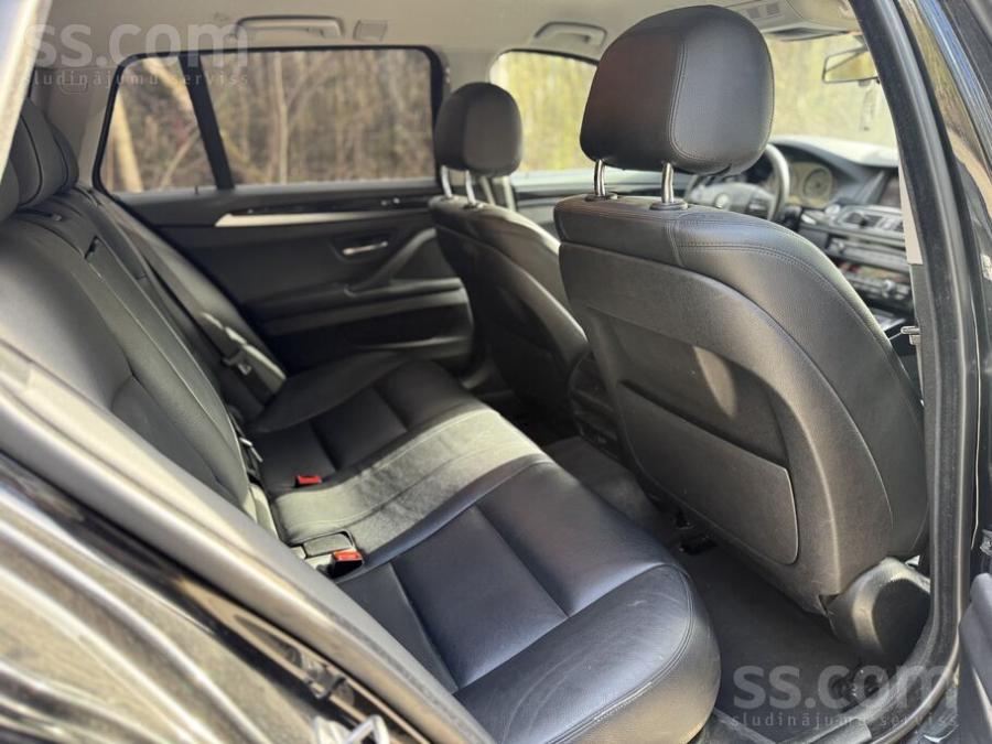 Black BMW 518 2016 in Riga, with an engine capacity of 2.00 L and mileage of 183 thousand km for 12900 €, photo 6 on AUTOMOTO.COM.LV